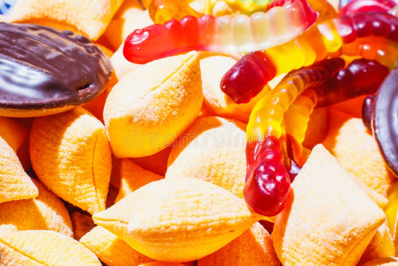 Bright Sweets in the Plate. Colored Gelatinous Soft Worms. Stock Photo ...