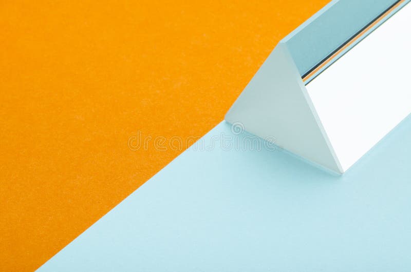 Bright Triangular Prism on Orange-blue Background Stock Photo - Image ...