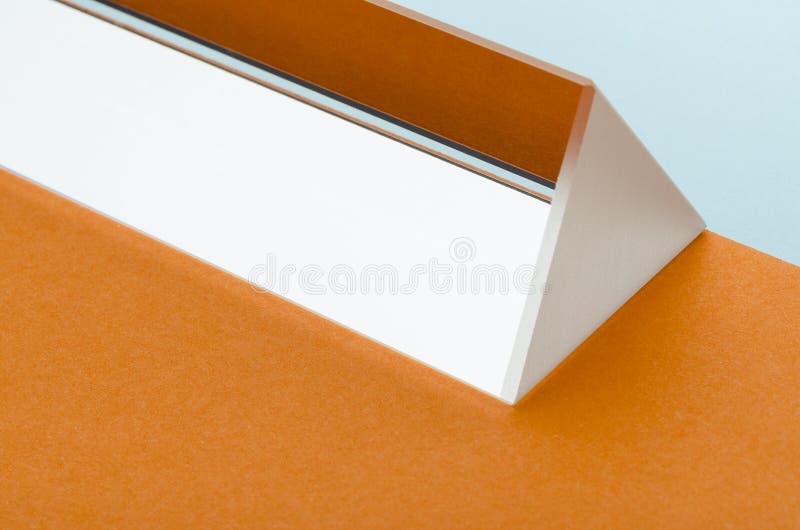 Bright Triangular Prism on Orange-blue Background Stock Image - Image ...