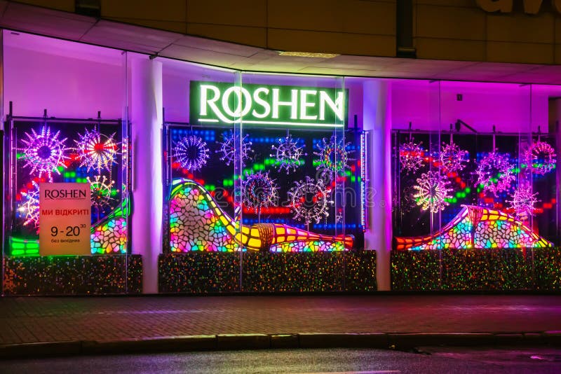 Bright and Unusual Window Display of Roshen Shop with Light Art ...