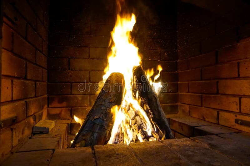 Bright Warm Fire in a Brick Fireplace Stock Image - Image of fireplace ...