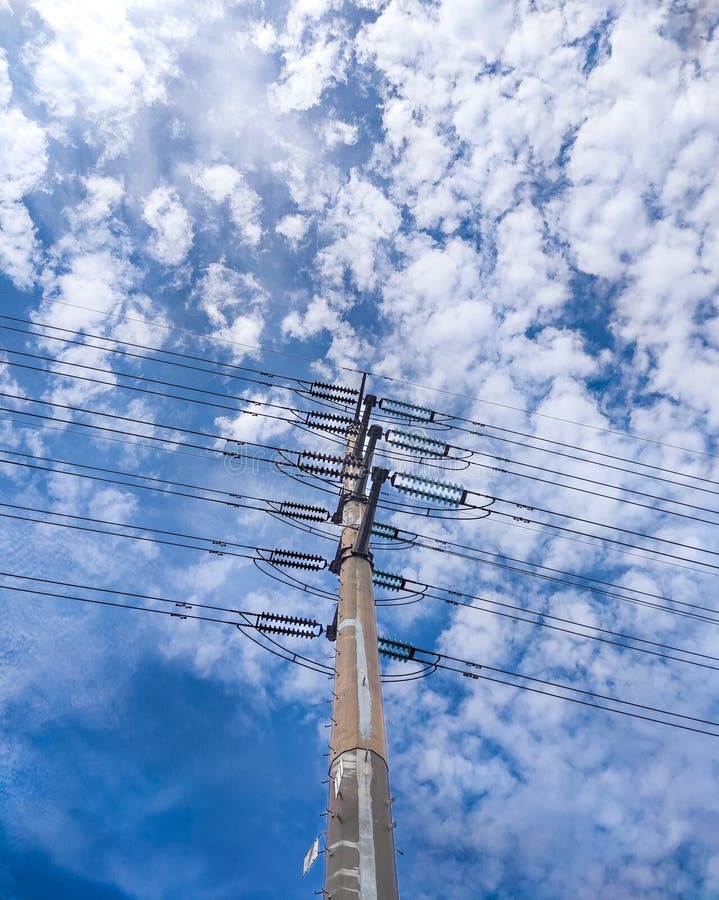 The Bright Weather Seen from Below a Streetlight Pole, with a Blue Sky ...