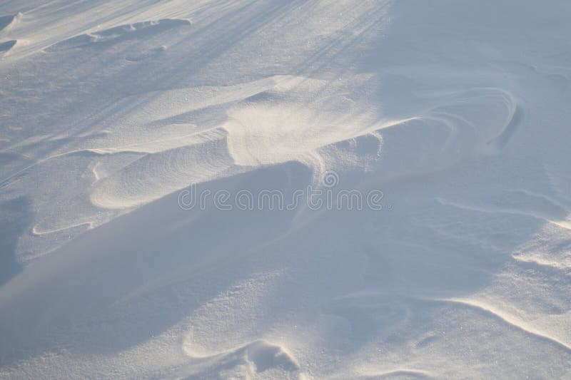 Wavy wind patterns in snow stock image. Image of season - 35284059