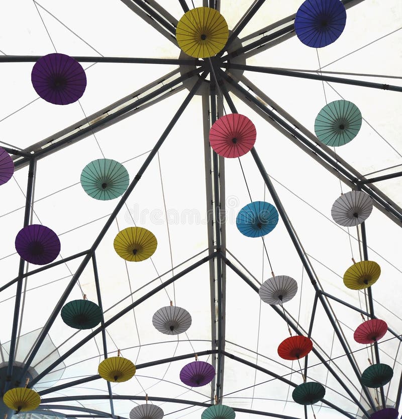 Bright White Ceiling with Colorful Upside Down Umbrella Decorations ...