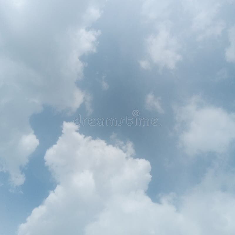 Bright White Clouds Shrouded in the Afternoon Sun Stock Image - Image ...