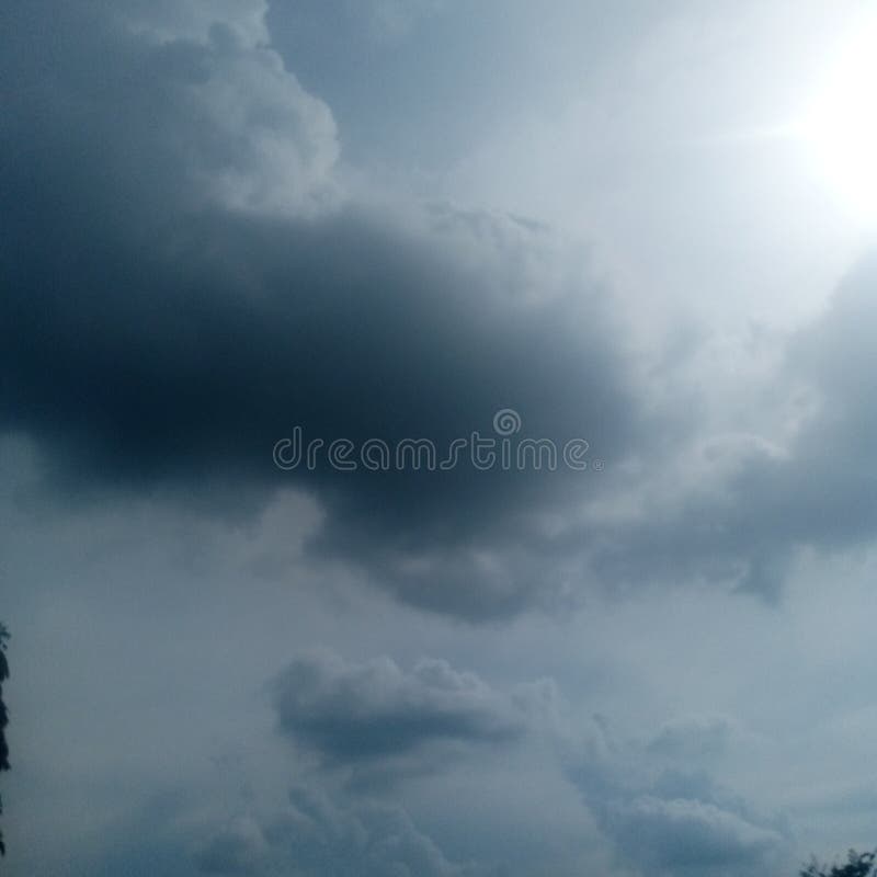 Bright White Clouds Shrouded in the Afternoon Sun Stock Photo - Image ...