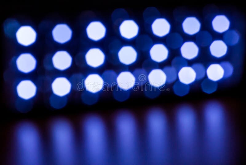 Bright White Fuzzy Lights Glow and Shine on a Dark Background_ Stock ...