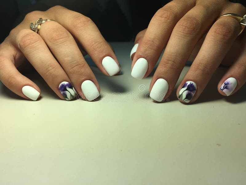 Bright White Manicure with Delicate Blue Flowers Stock Photo - Image of ...