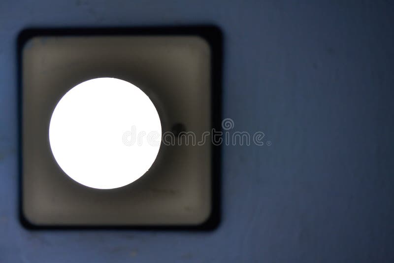White Round Light Stuck To the Blue Wall Stock Image - Image of fork ...