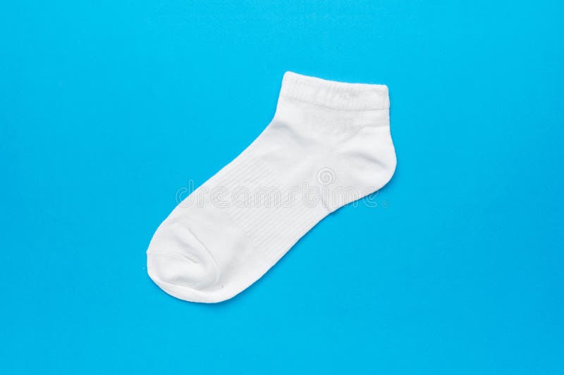A Bright White Sock on a Blue Background Stock Photo - Image of clean ...