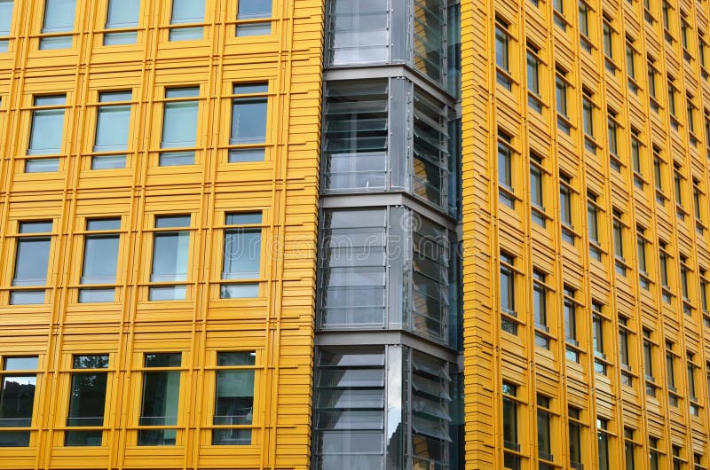 Bright Yellow Building Corner Stock Photo - Image of buildings, city ...