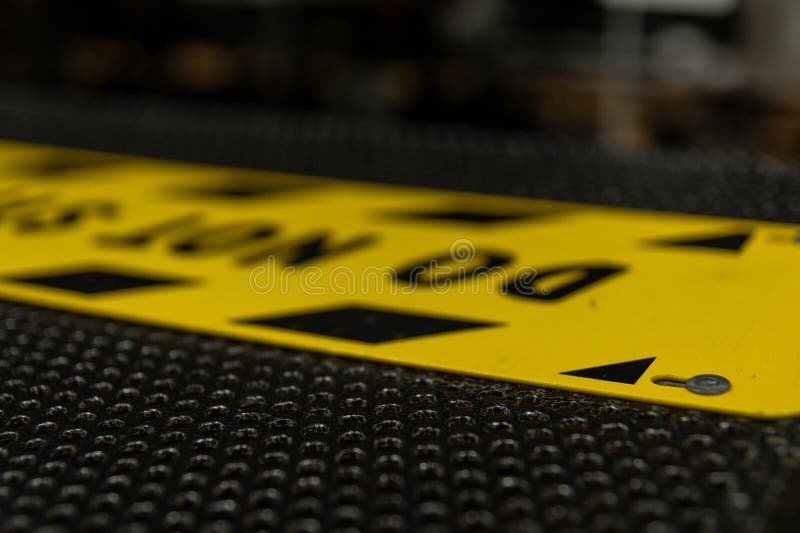 Bright Yellow Caution Sign with Bold Black Lettering and Triangular ...