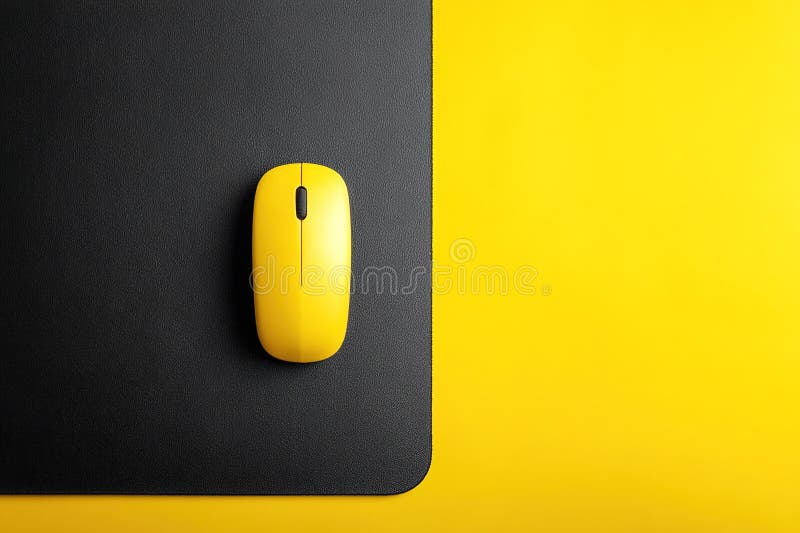 Bright Yellow Computer Mouse on a Black Mouse Pad Against a Vibrant ...