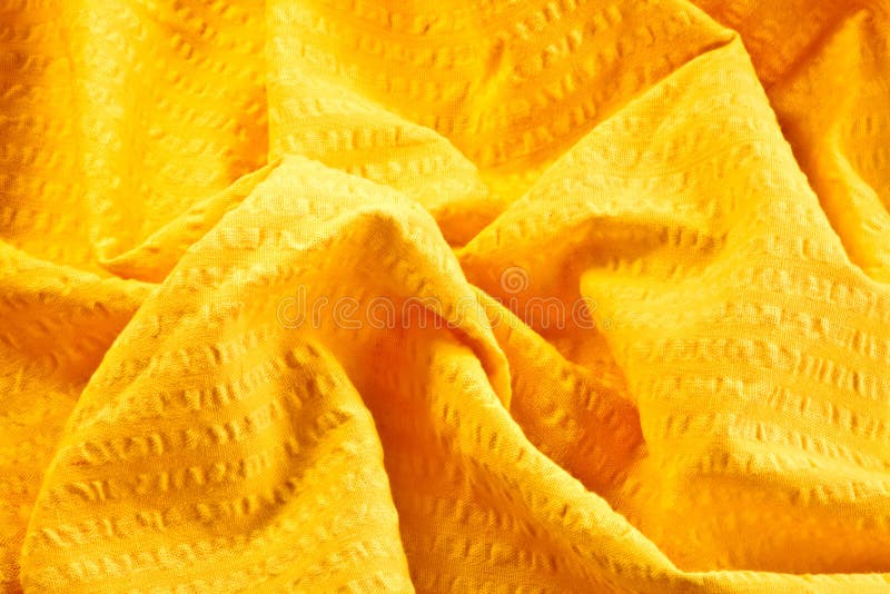 Bright Yellow Cotton Fabric Stock Photo - Image of folds, material ...