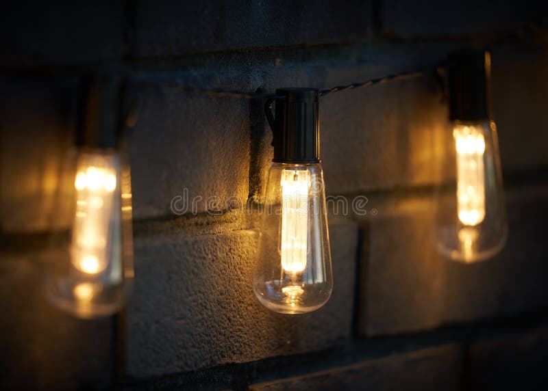 Bright Yellow Lights Hanging in the Night Garden Stock Image - Image of ...