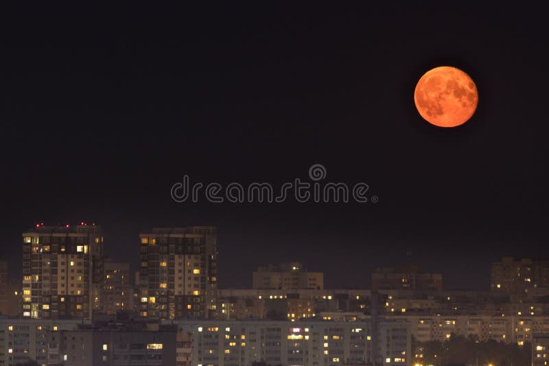 Bright Yellow Moon in Dark Night Sky Above the City Stock Image - Image ...
