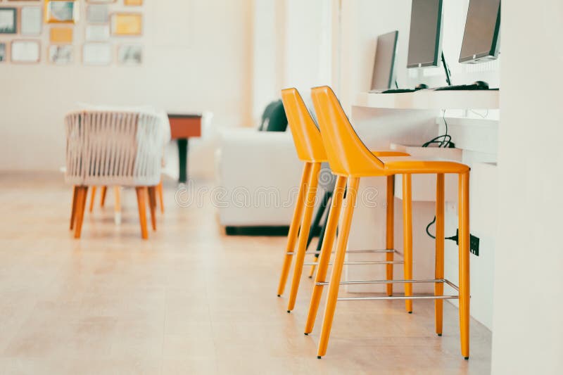 A Bright Yellow Padded Chair for Typing in the Computer in the Internet ...