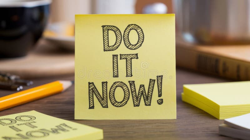 A Bright Yellow Post-it Note with the Words "Do it Now!" Handwritten in ...