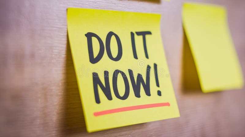 A Bright Yellow Post-it Note with the Words "Do it Now!" Handwritten in ...