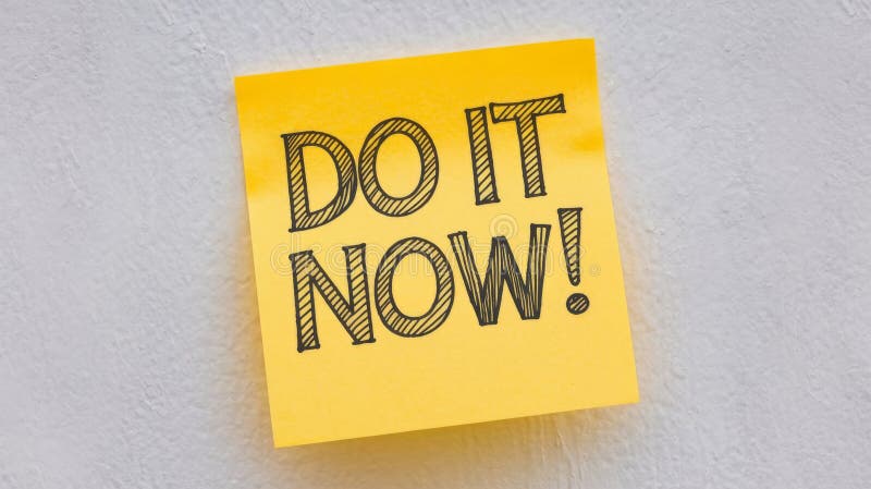A Bright Yellow Post-it Note with the Words "Do it Now!" Handwritten in ...