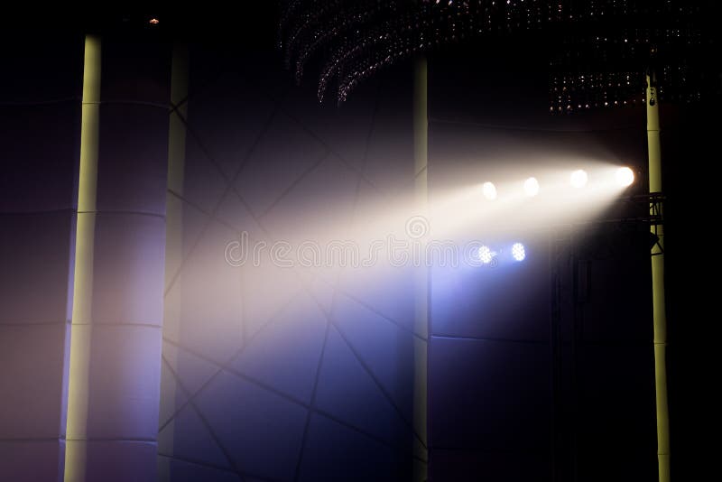 Bright Yellow Projector Lights on the Pole. Stock Image - Image of ...