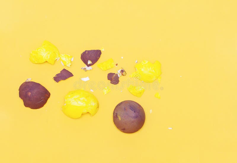 Painted Eggshell on a Yellow Pastel Background. Stock Image - Image of ...