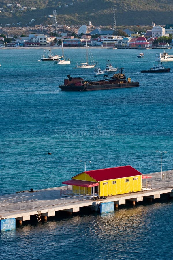Bright Yellow and Red Building on Pier in Harbor Stock Image - Image of ...