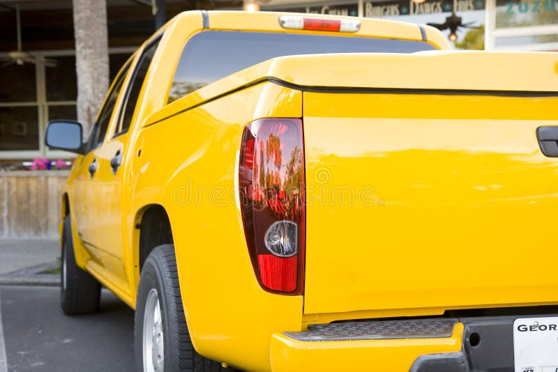 Yellow Pickup Trucks stock image. Image of tailgate, line - 256453
