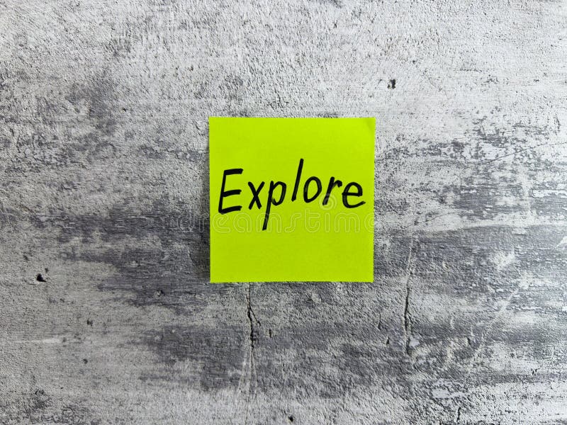 Bright Yellow Sticky Note Displaying the Word Explore on a Textured ...