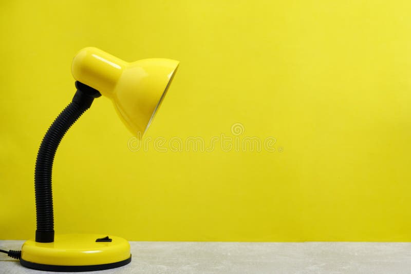 Bright Yellow Table Lamp Yellow Wall Background. Stock Image - Image of ...