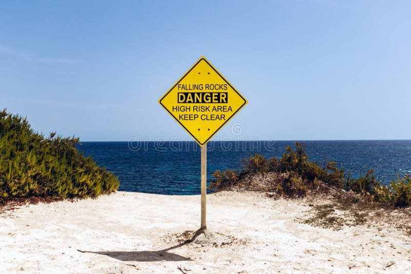 Bright Yellow Warning Sign "Falling Rocks - Danger - High Risk Area ...