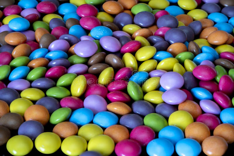 Colorful Candy Collection Scattered Across a Vibrant Background Stock ...