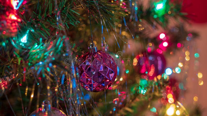 Brightly Colored, Cheery Christmas Tree Ornaments Hung Up with Lights ...