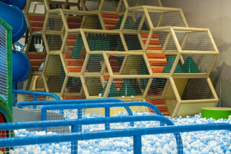 Brightly Colored Climbing Structures with Mesh Walls Create an Engaging ...