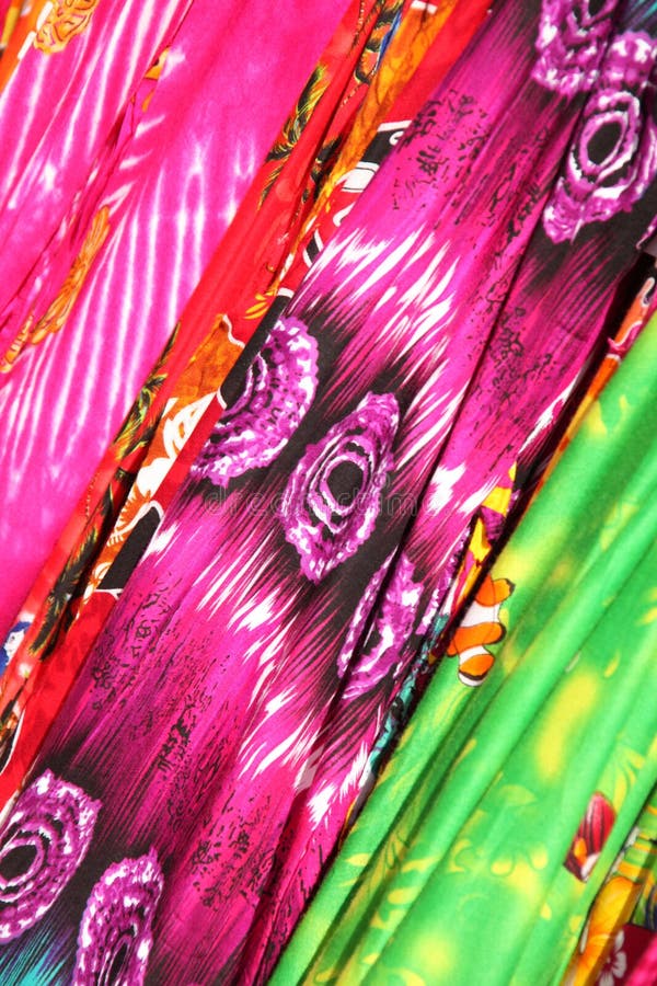 Brightly Colored Printed Fabrics with a Caribbean Beach Style Stock ...