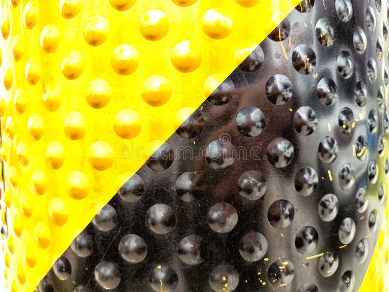 Brightly Colored Textured Surface Shows Yellow and Black Patterns in ...
