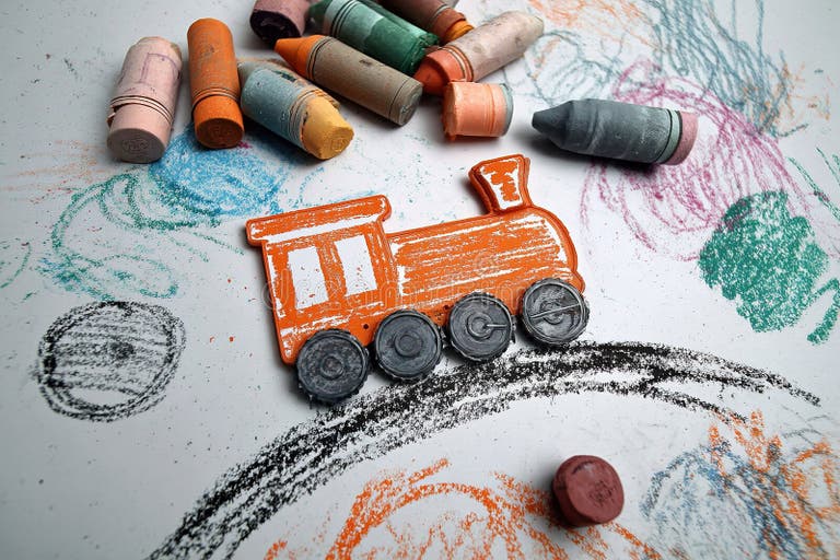 Brightly Colored Train Drawing on Paper Surrounded by Various Crayons ...