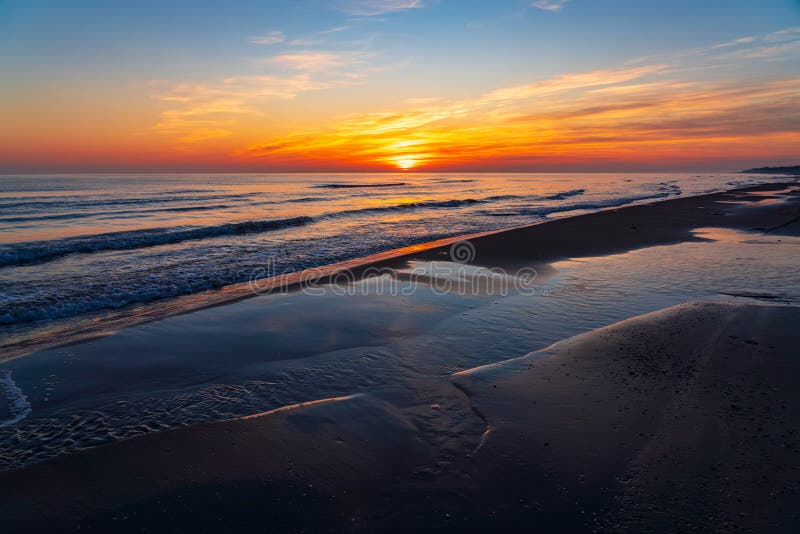 Brightly Colorful Sunrise on the Sea Coast.Nature Wallpaper Stock Image ...