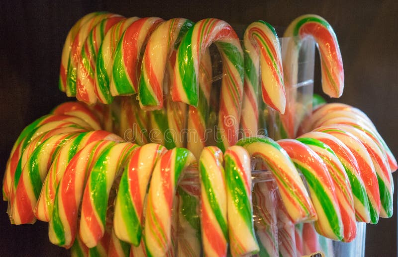 Brightly Coloured Candy Canes in a Jar Stock Image - Image of black ...