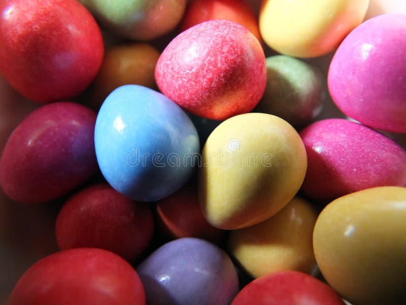 Brightly Coloured Easter Egg Sweets Stock Photo - Image of pink, yellow ...