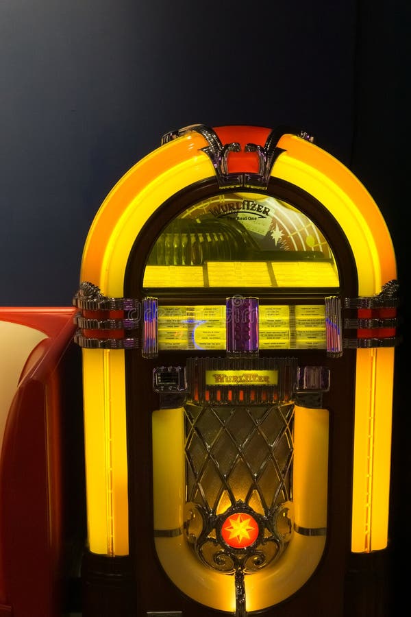 Brightly Illuminated Jukebox on Dark Background Editorial Photography ...