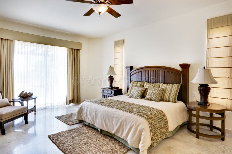 Brightly Lit Bedroom stock photo. Image of bedroom, travertine - 10182274