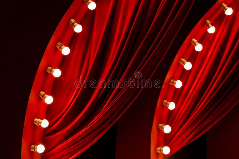 Brightly Lit Stage Featuring Red Curtains with Small Bulbs Stock Image ...