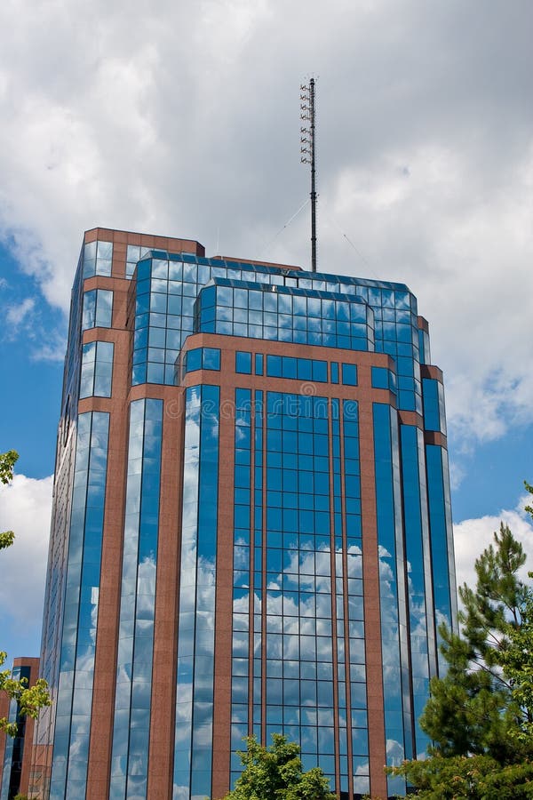 Brilliant Blue Sky Reflected in Glass Office Tower Stock Image - Image ...