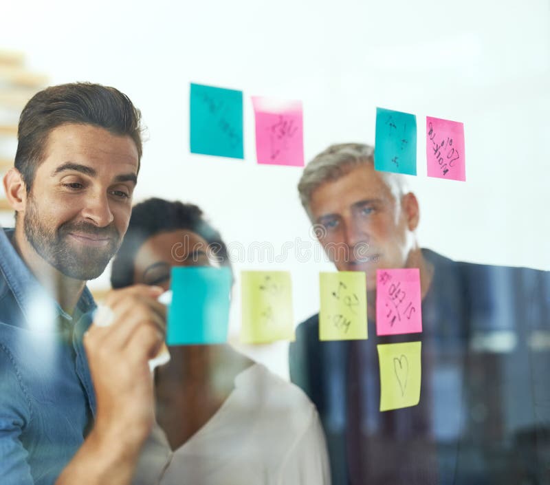 Brilliant Brainstorming in Action. a Group of Colleagues Having a ... Brilliant Brainstorming in Action. a Group of Colleagues Having a ...