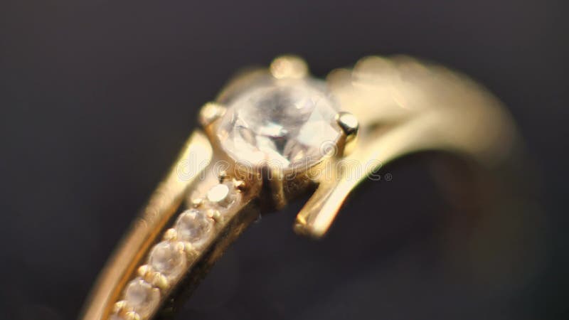 A Brilliant-cut Diamond Set on a Ring. Close-up Side View Stock Video ...