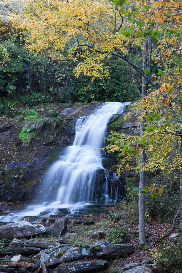 Brilliant Fall Foliage Surrounds Soft Flowing Waterfall Stock Image ...