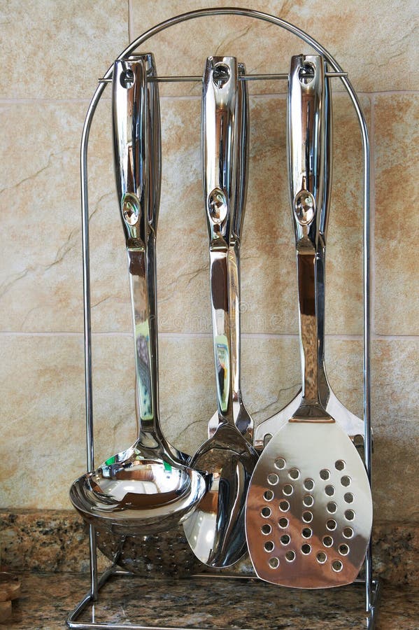 Kitchen Tools Hanging in a Restaurant Kitchen Stock Image - Image of ...