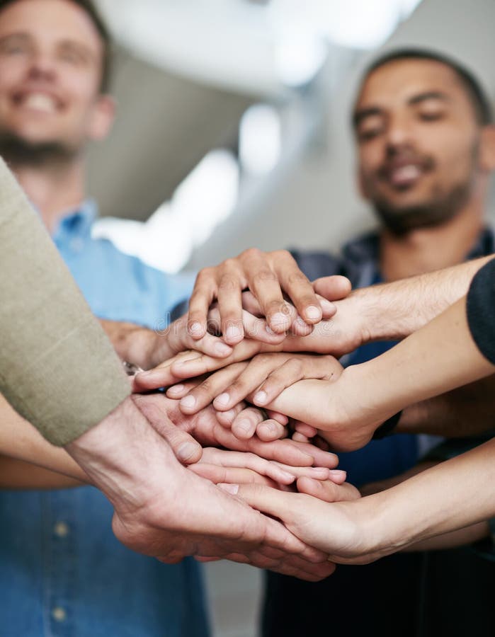 Bring it in for the Team. Cropped View of a Multi Ethnic Group Putting ...