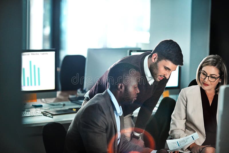 Bringing a Wealth of Different Ideas To the Table. Three Businesspeople ...
